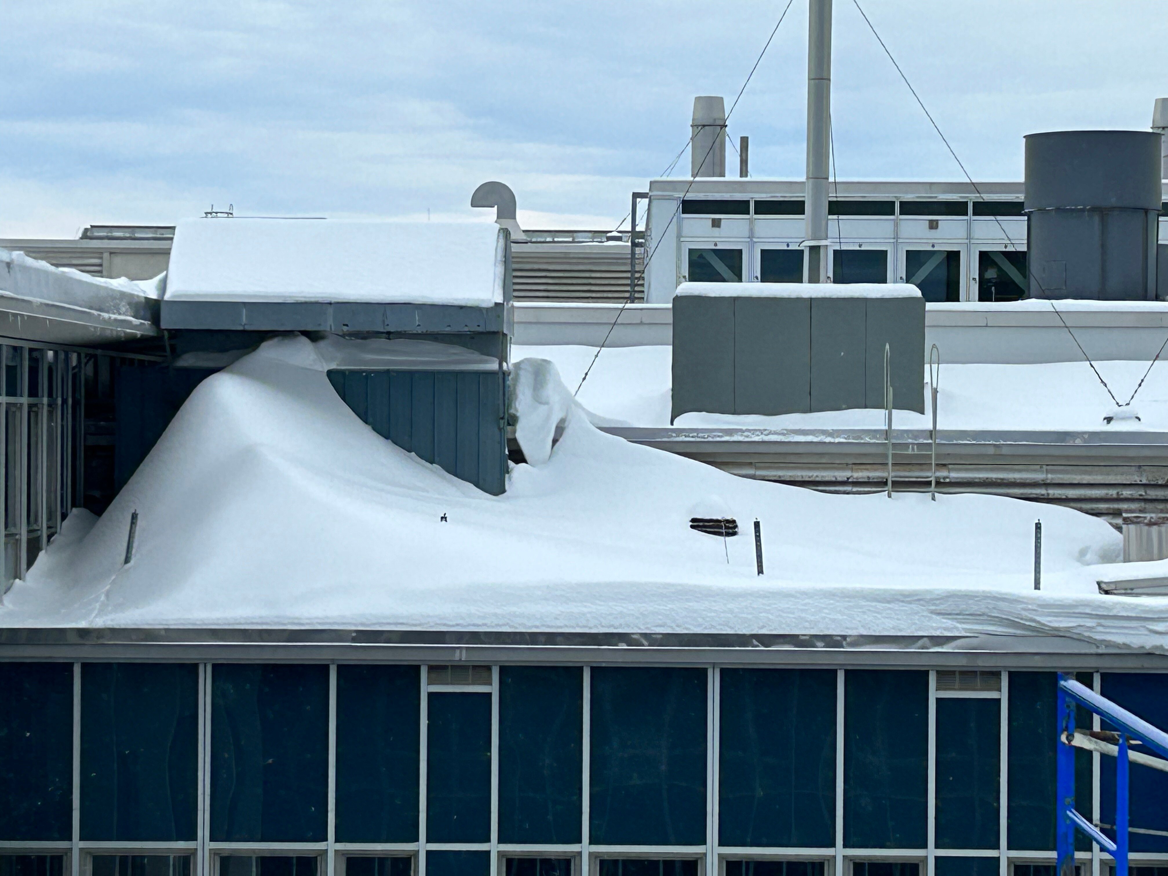 How To Safely Clear Snow from Industrial Roofs